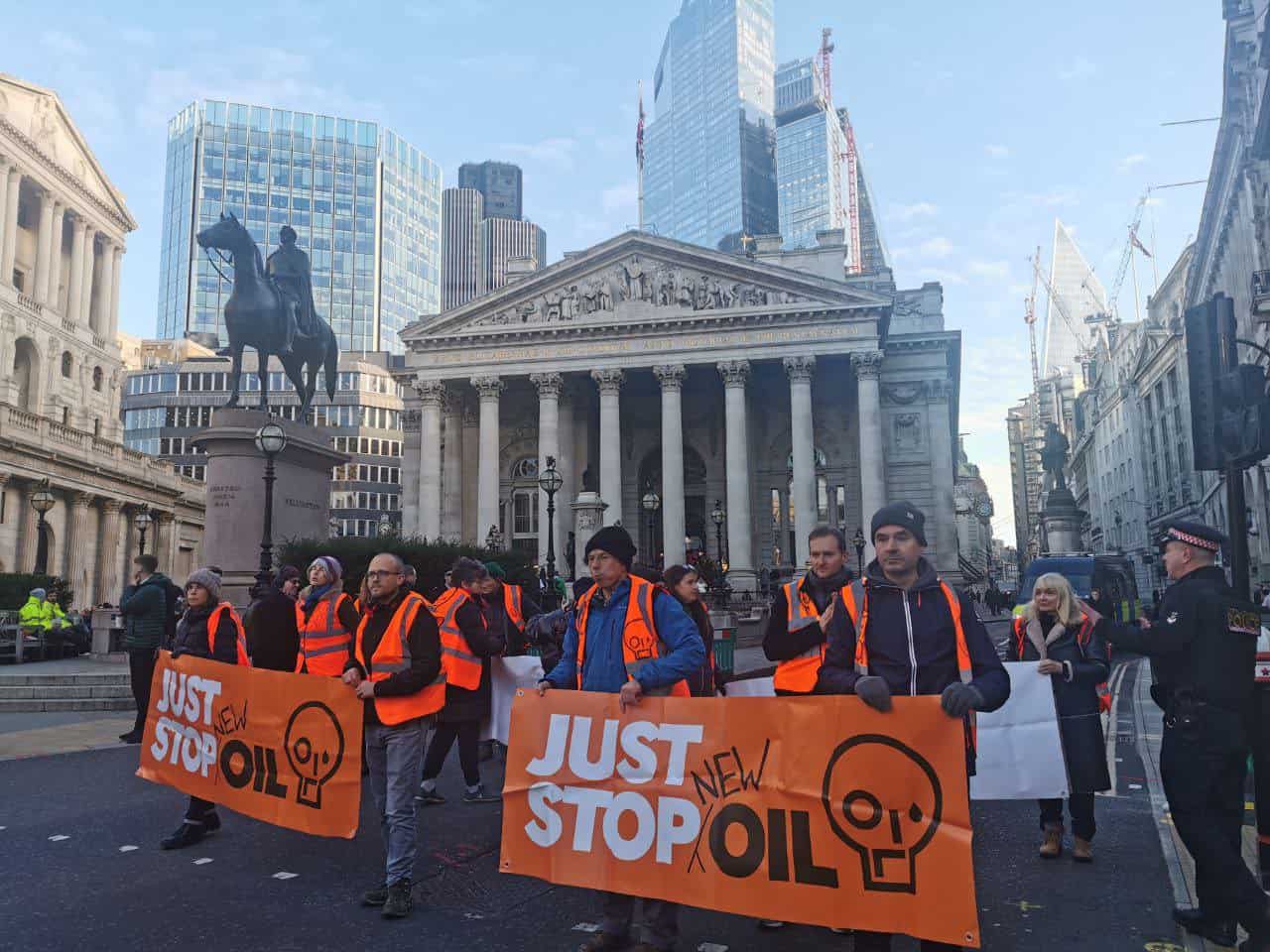 Just Stop Oil supporters stroll through South London and City traffic ...